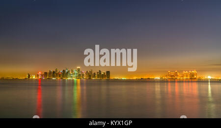 Night view of skyline of Doha - the capital of Qatar Stock Photo - Alamy