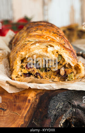 Pork roll - spicy sausage meat with chillies and beans in puff pastry ...