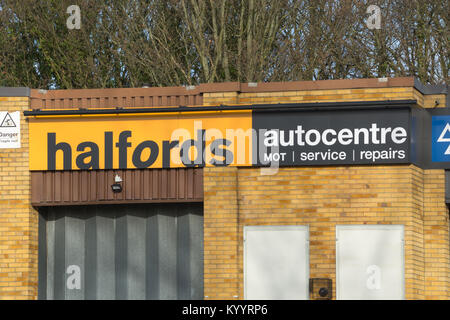 Halfords AutoCentre sign Stock Photo - Alamy