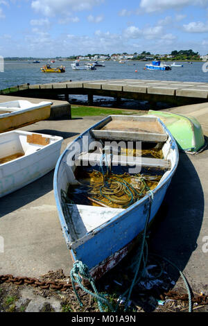 Sailing boat on Mudeford quay with lifeboat station and The Haven pub ...