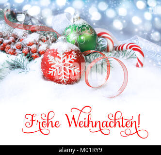 Christmas ball with red bow and twisted ribbon with spruce branches ...