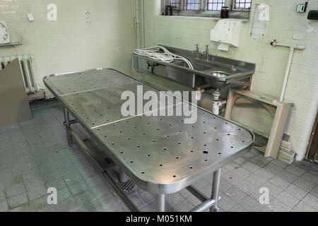 Autopsy table at the morgue Stock Photo - Alamy