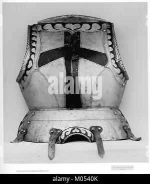 This breastplate is a metal armor piece designed for protection ...