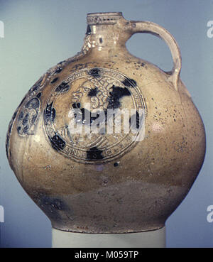 This bottle jug is a functional and decorative ceramic piece, with a ...