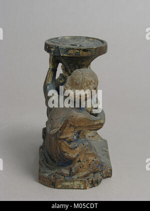 This artwork, Candlestick Held by Two Angels, depicts two angels ...