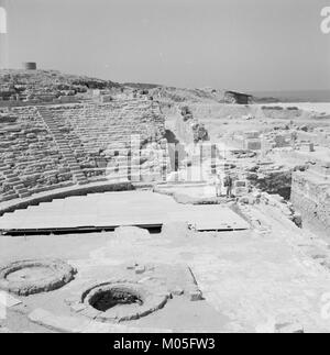 This image depicts the ancient Roman amphitheater of El Jem, Tunisia ...