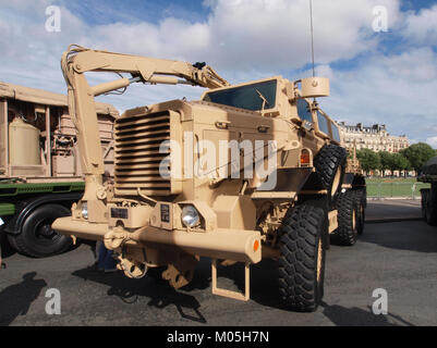 A photograph of a Buffalo MRAP (Mine Resistant Ambush Protected Vehicle), a military vehicle ...