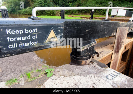 CANAL LOCK BOAT CILL MARKER WARNING SIGN ON A BRITISH CANAL LOCK GATE ...