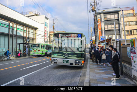 Kyoto, Japan. The busy central bus station, outside the main railway ...