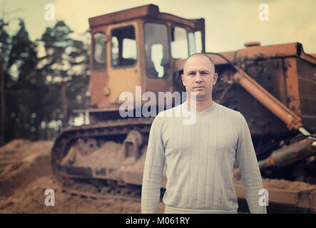 Portrait of tractor operator at workplace Stock Photo - Alamy