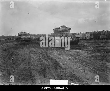 The image depicts a British tank regiment practicing military exercises ...