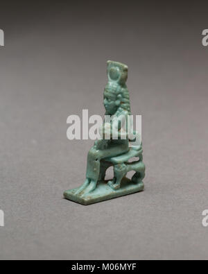 This depiction of Isis nursing Horus on a throne supported by lions is ...