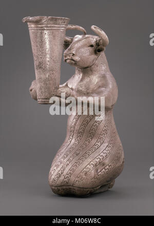 Kneeling bull holding a spouted vessel Proto-Elamite ca. 3100–2900 B.C ...