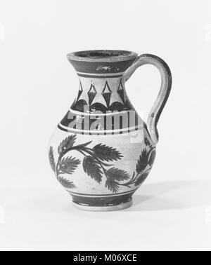 This jug exemplifies ancient pottery, showcasing craftsmanship ...