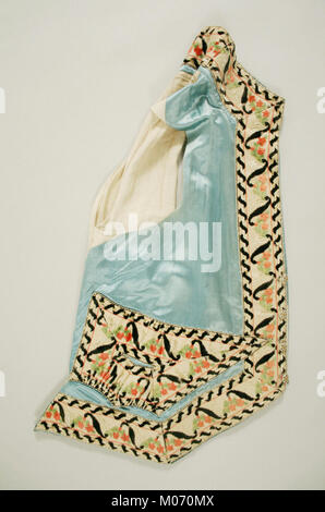 A historical livery garment represents rank-specific clothing ...
