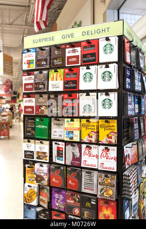 Various gift cards on display on a store rack Stock Photo - Alamy