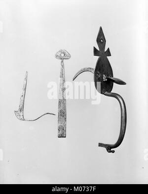 This latch, bar, and catch mechanism was used to secure doors or gates ...