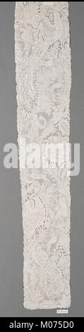 A lappet, part of a pair, traditionally worn in historical fashion as ...