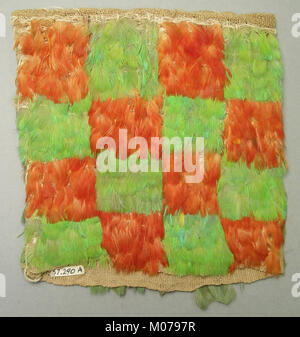 This miniature dress is a delicate piece of craftsmanship, reflecting ...