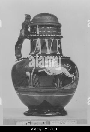 This jug is a preserved example of ancient ceramic work, with a ...