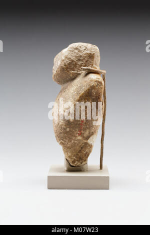 This magical captive figure represents symbolic meaning and is linked ...
