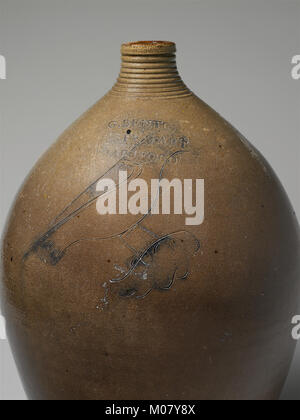 This jug is an example of ancient pottery, showcasing detailed ...