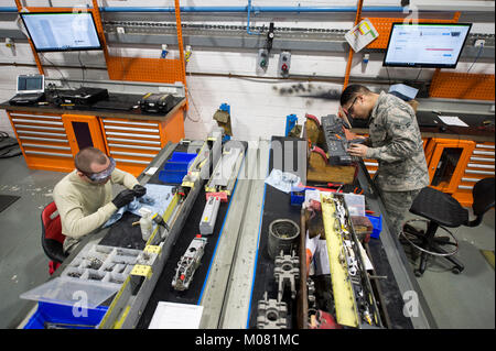 Airmen assigned to the 48th Munitions Squadron aircraft armament ...