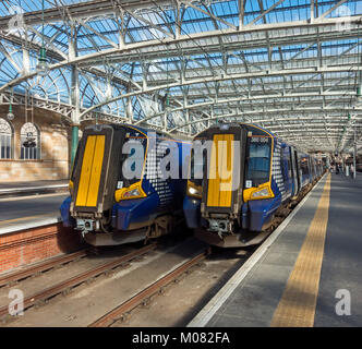Scotrail Class 380 electrical multiple units trains at platforms in ...