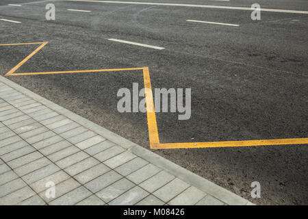 Road markings indicating no stopping or parking bus station Stock Photo ...