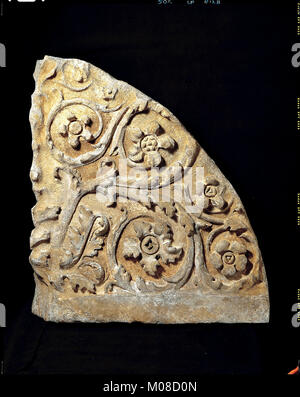 This marble acroterion features acanthus scroll motifs, a decorative ...