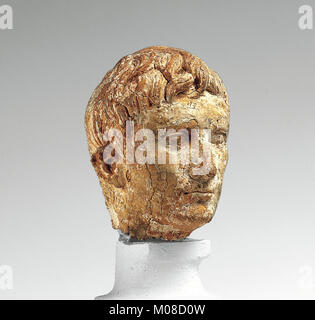 The ivory portrait head depicts Emperor Augustus, showing his regal ...