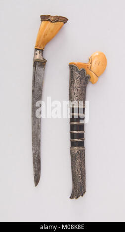 This Bade-bade knife with sheath demonstrates functional design and ...
