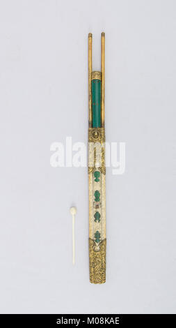 This set of knife, sheath, chopsticks, and earspoon represents ...