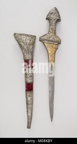 Traditional Kris blade with a wavy form and sheath, historically ...
