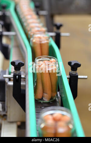 Sausages. Packing line of sausage. Industrial manufacture of sausage products Stock Photo ...