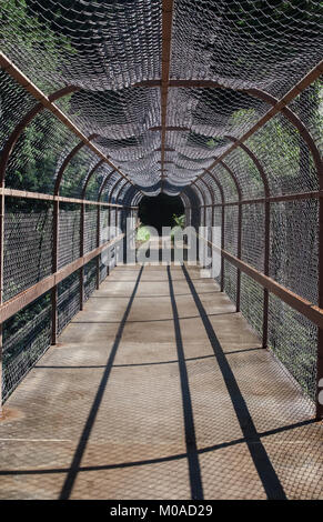 Walking Bridge enclosed for Safety Stock Photo - Alamy