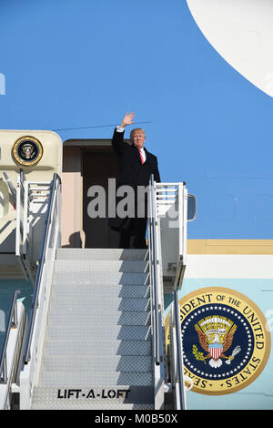 President Donald Trump disembarks Air Force One upon his arrival at ...