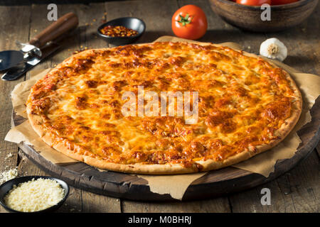 Delicious Homemade Cheese PIzza Cut into Square Slices Stock Photo - Alamy