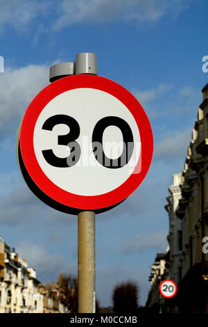 A road sign indicating 30 mph speed limit Stock Photo - Alamy