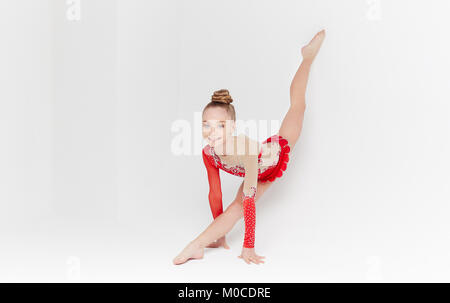 Attractive young girl doing split Stock Photo - Alamy