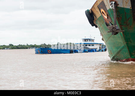 Barge carrying quarry materials, Mekong delta Stock Photo - Alamy