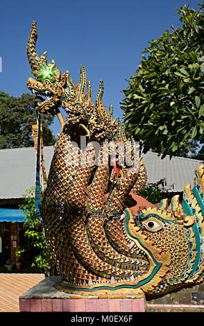 Golden Naga Serpent Statue Guarding Temple Staircase in Southern ...