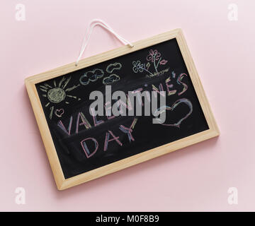 Blackboard with Happy Valentines day written in pink chalk Stock Photo ...