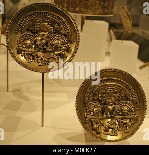 Pre-Columbian art: Chimu gold burial mask, with shell ear-plugs and ...