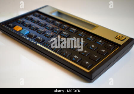 Old Hewlett Packard scientific calculator pictured on a white ...