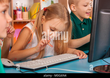 Children computer class us for education and video game Stock Photo - Alamy