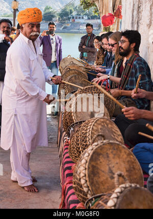 Renowned Rajasthani drummer Solanki Nathu Lal teaches students, Pushkar ...