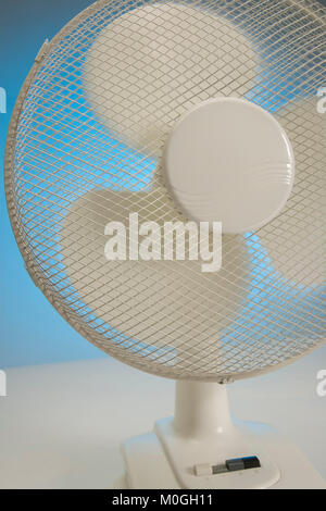White desk fan studio still life Stock Photo - Alamy