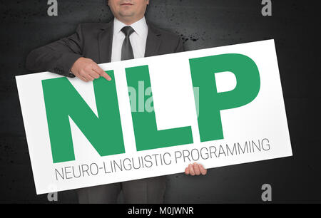 NLP poster is held by businessman Stock Photo - Alamy