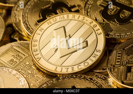 litecoin close up on top of euro paper monete virtual currency concept ...